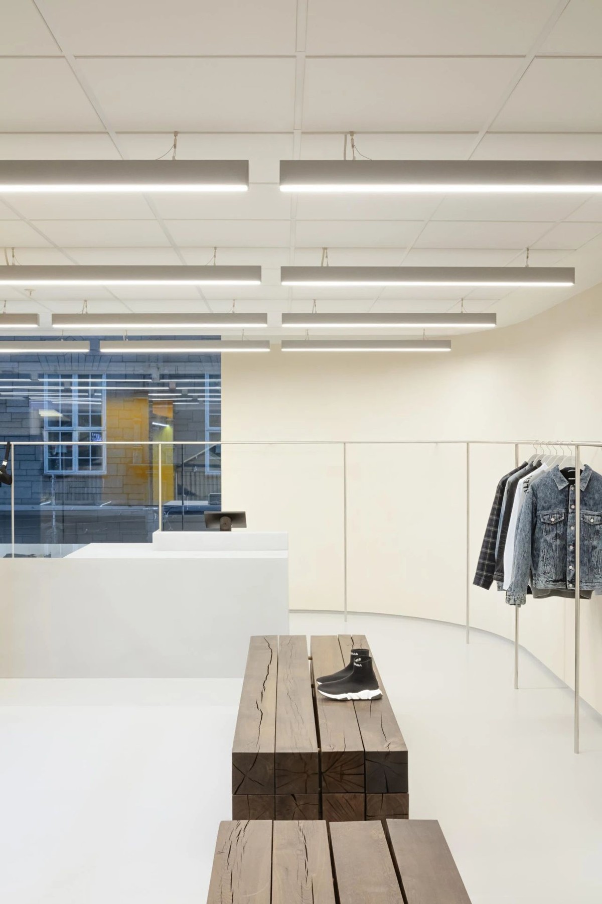 Collage, a luxury fashion retail store for men and women, bright yellow ...