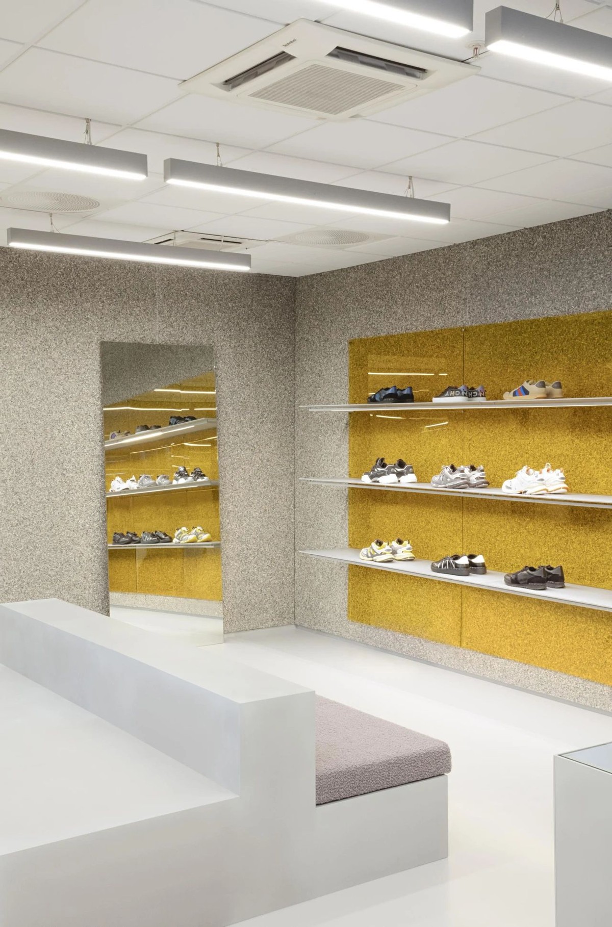 Collage, a luxury fashion retail store for men and women, bright yellow ...