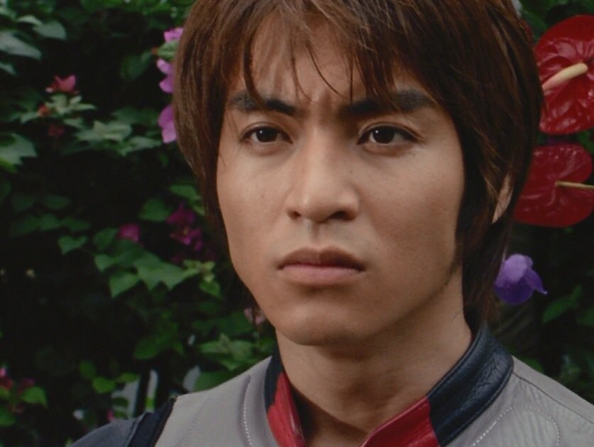 Takeshi Tsuruno served as the Olympic torchbearer and passed the torch ...