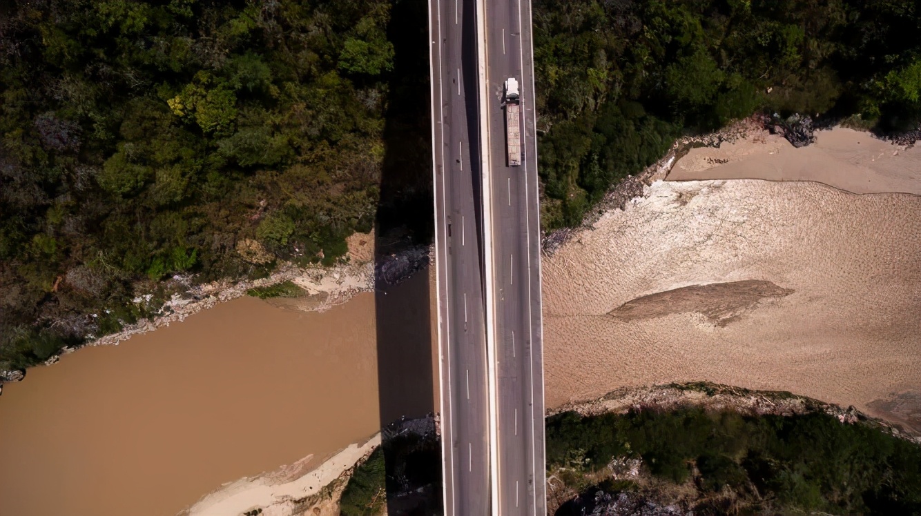 The Japanese built a bridge in Honduras. After the hurricane, the ...