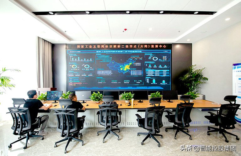 Two full pages of China Energy News focus on Jinneng Holding Group - iMedia
