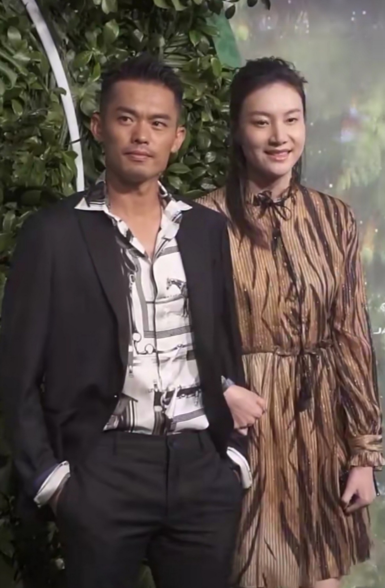Xie Xingfang showed up with Lin Dan's arm, and the couple were both ...