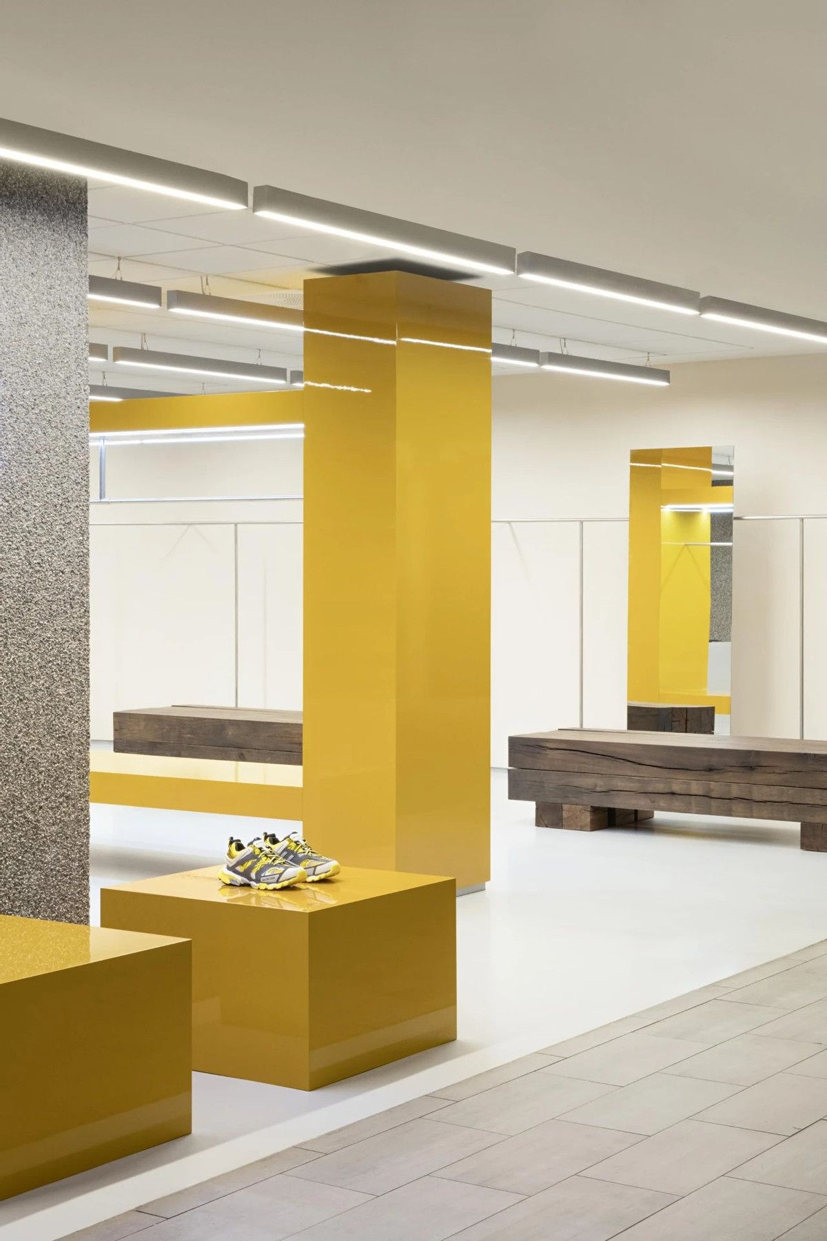 Collage, a luxury fashion retail store for men and women, bright yellow ...