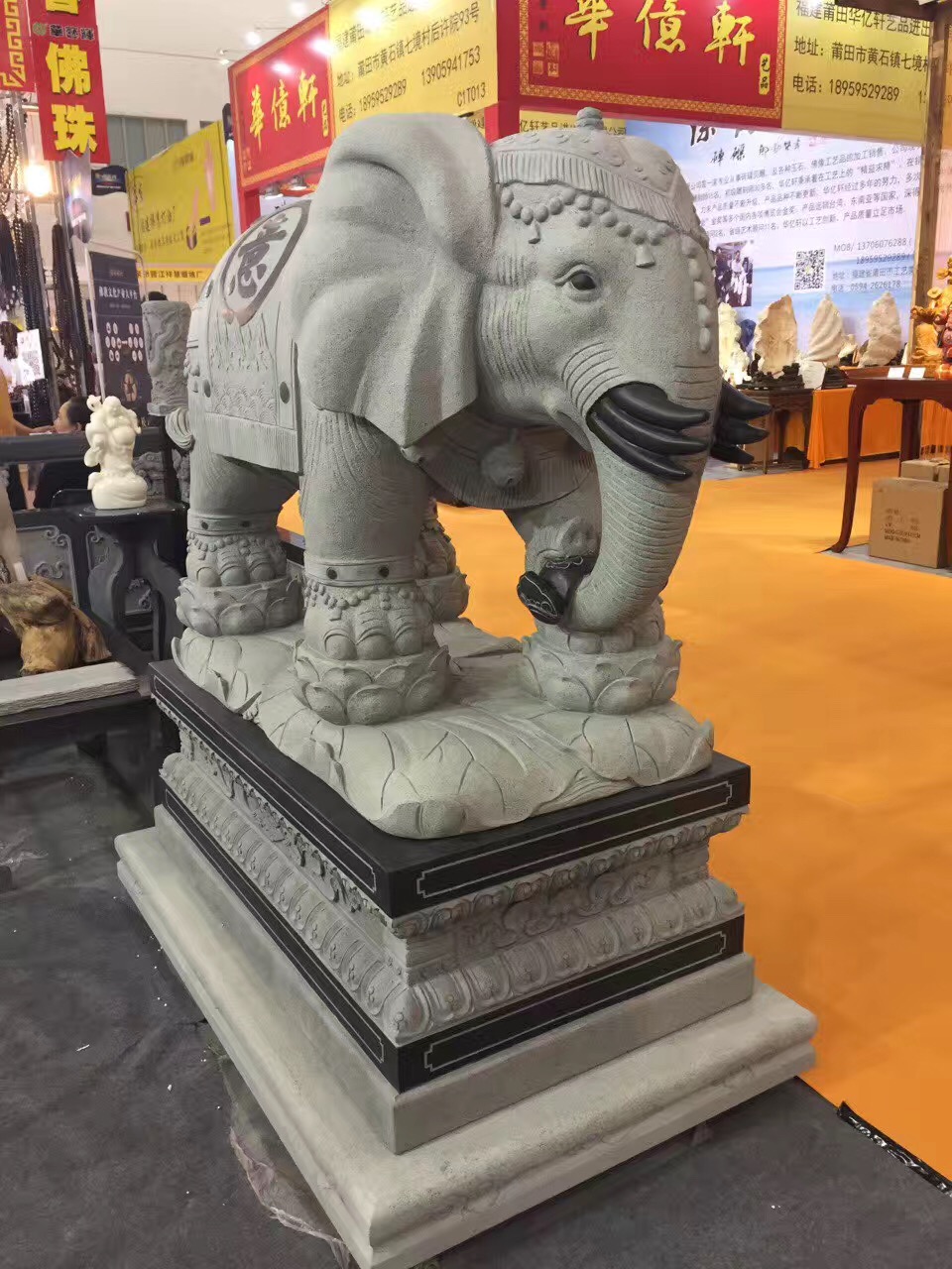 Is the stone-carved elephant in the shape of a six-tooth white elephant ...