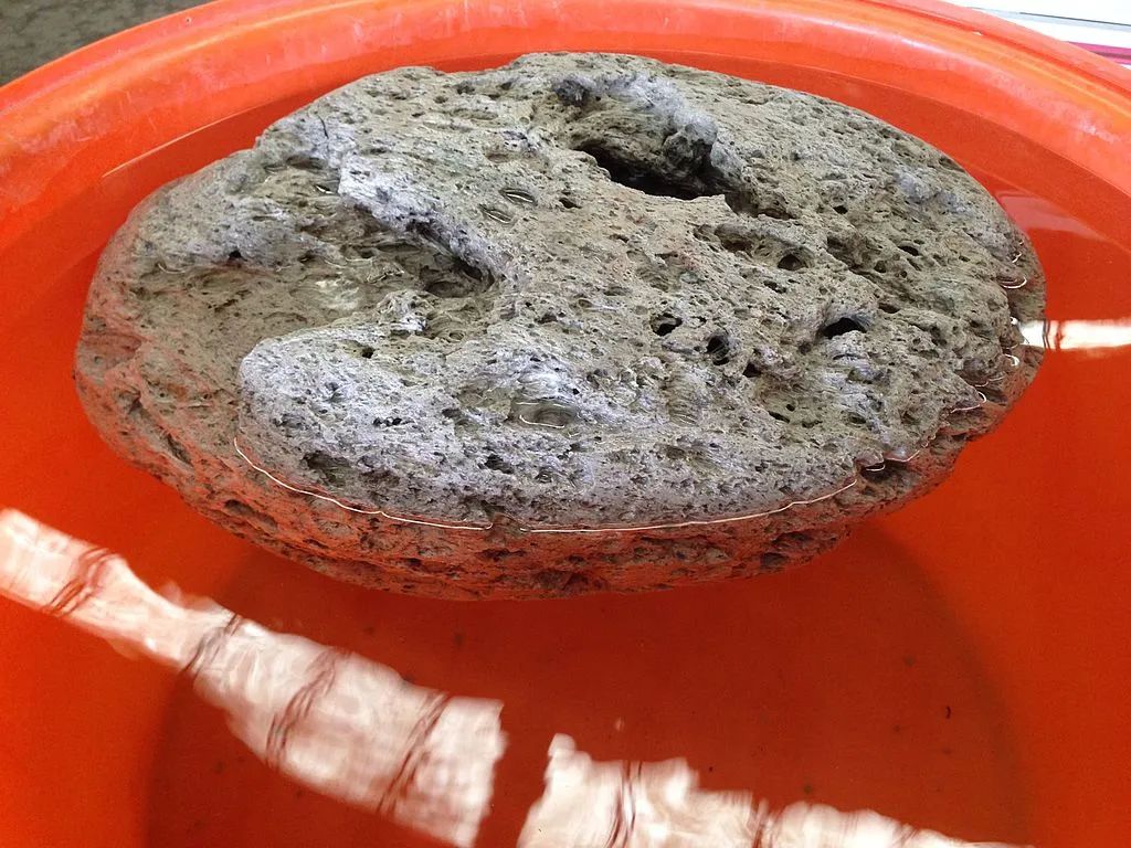 An island floats on the sea, but piles of rocks float on the water ...