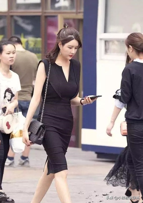 The deep V dress is elegant and outstanding, revealing but not vulgar ...