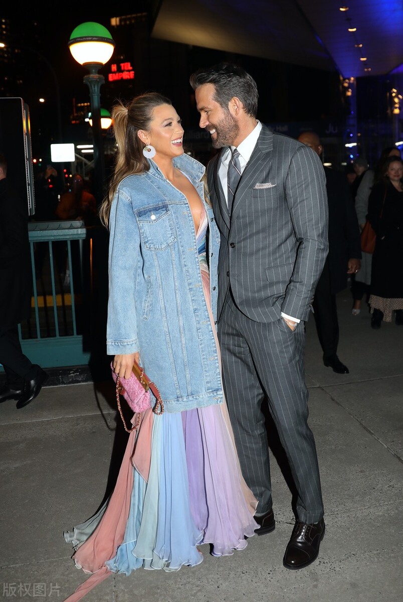 Blake Lively and husband Ryan Reynolds smile at each other - iMedia